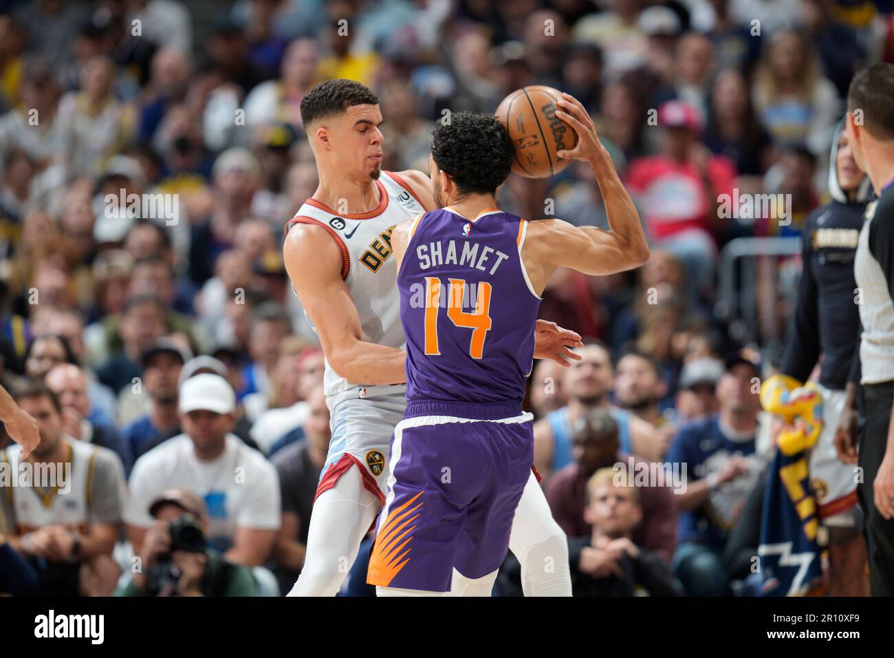 Phoenix Suns guard Landry Shamet (14) and Denver Nuggets forward ...