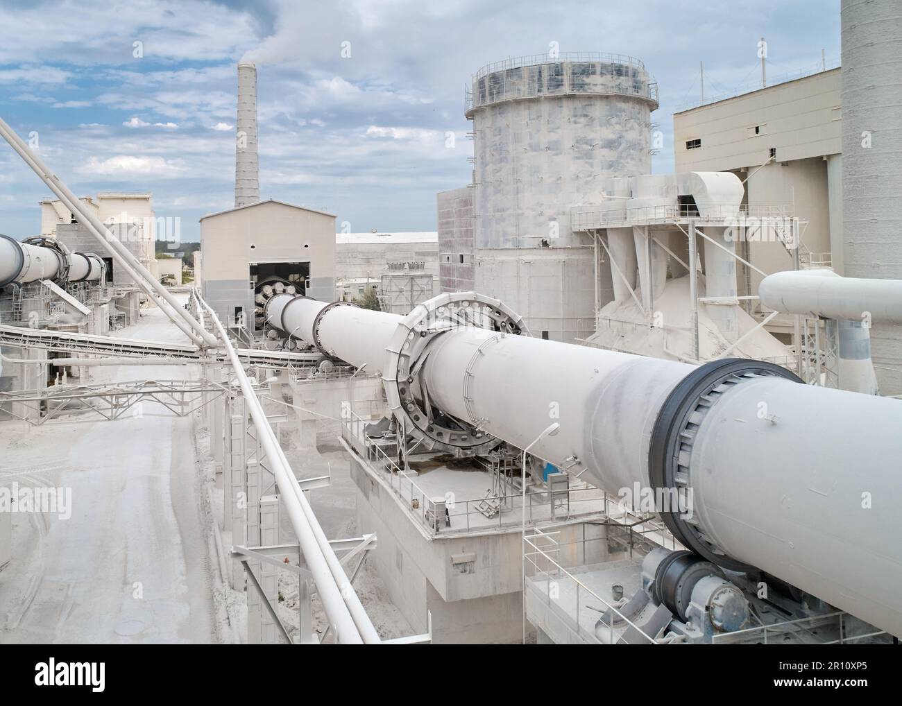 Calx roasting rotating furnace with pipe and steam at plant Stock Photo ...