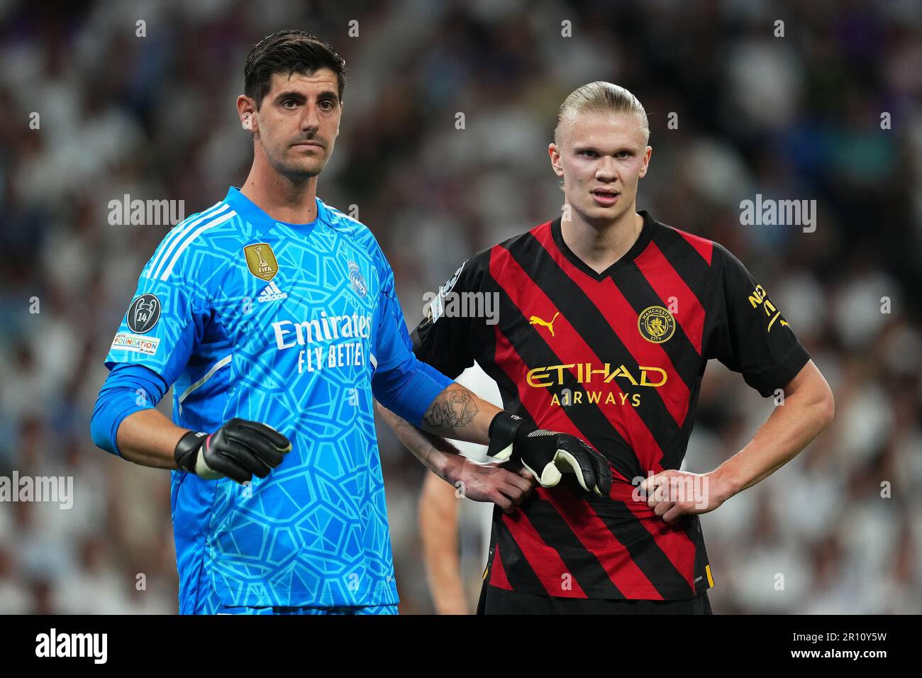 Madrid, Spain. May 9, 2023, Thibaut Courtois of Real Madrid and Erling Haaland of Manchester ...