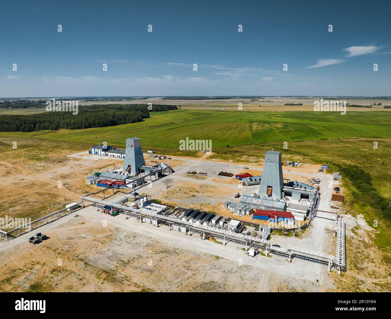Huge construction site for building new mine by green fields Stock ...