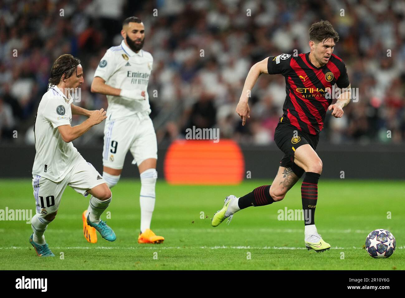 Madrid, Spain. May 9, 2023, John Stones of Manchester City and Luka ...