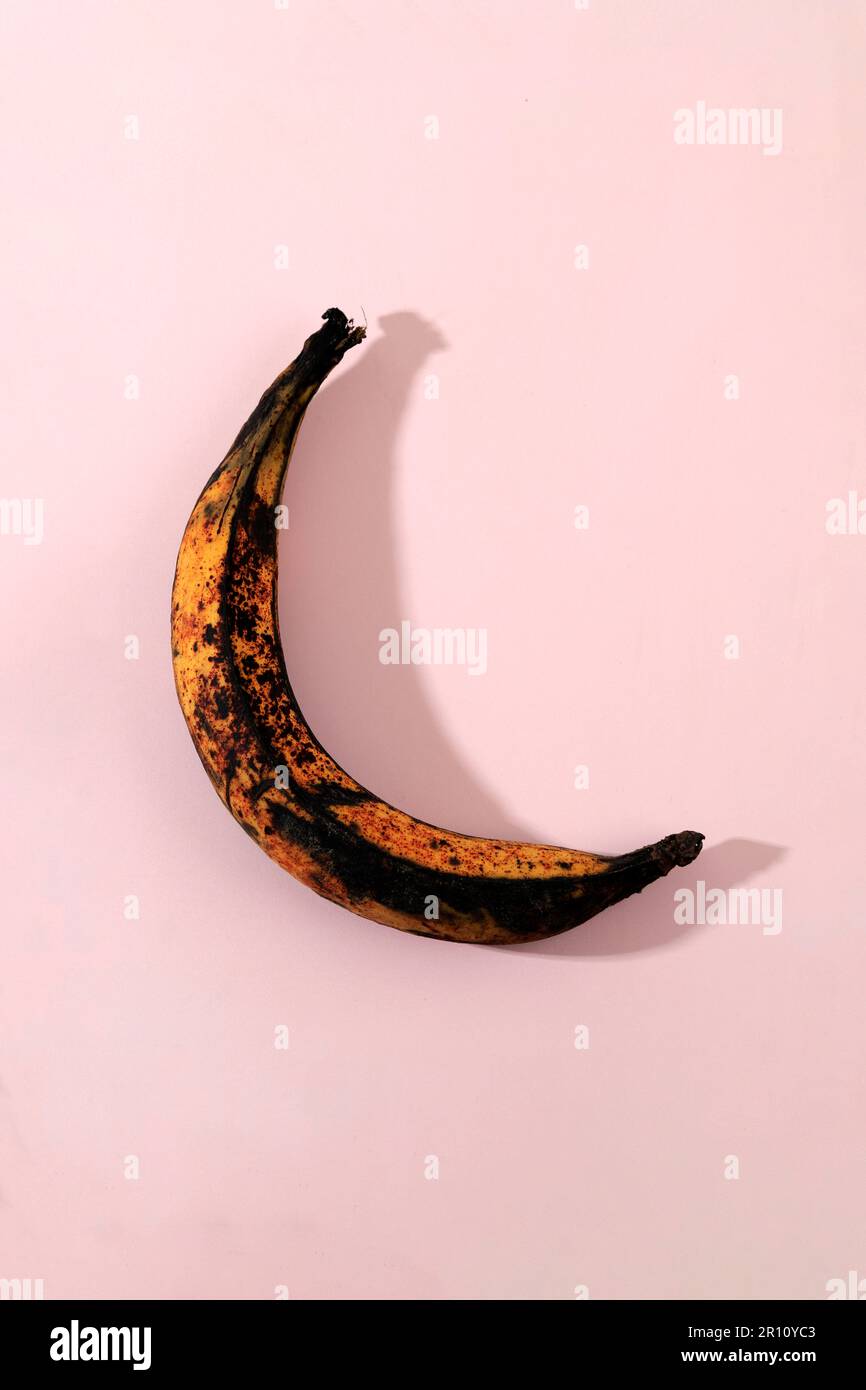 Top View Over Ripe Rotten Banana on Pink Background Stock Photo - Alamy
