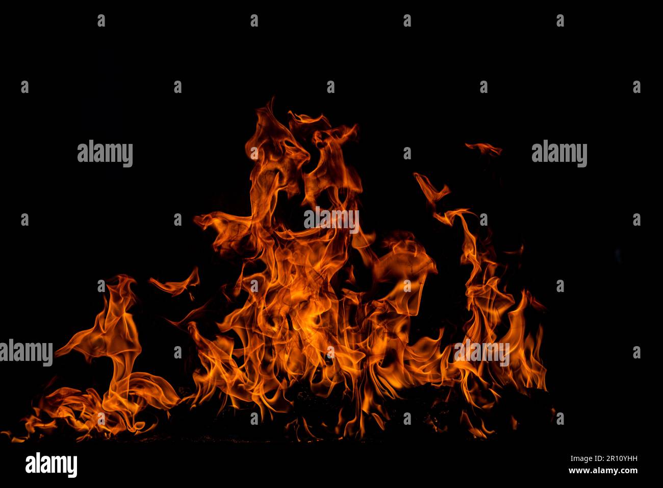 Texture of fire on a black background. Abstract fire flame background ...