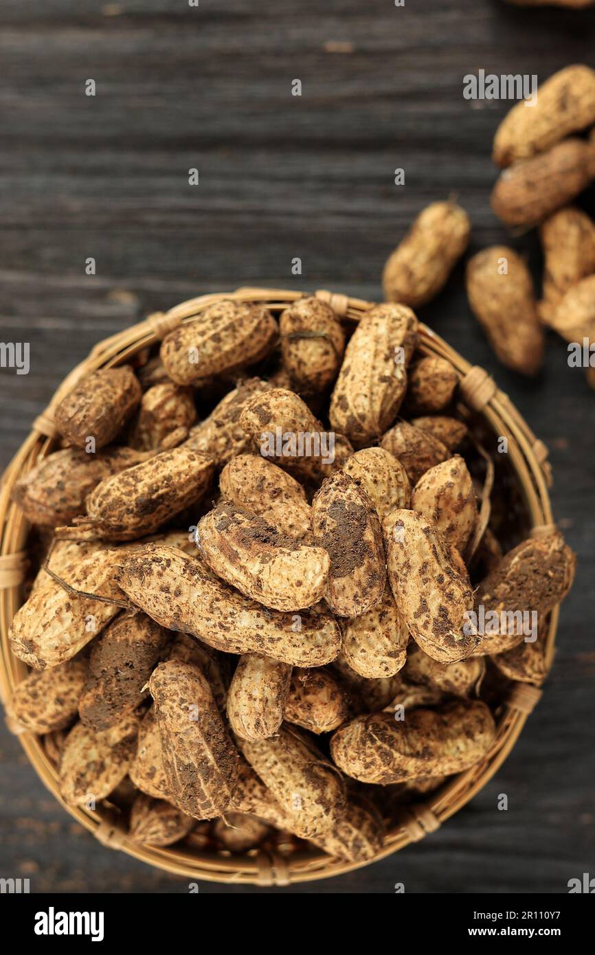 Fresh Harvest Ground Peanut on Rattan Bowl, Top View. Copy Space for ...