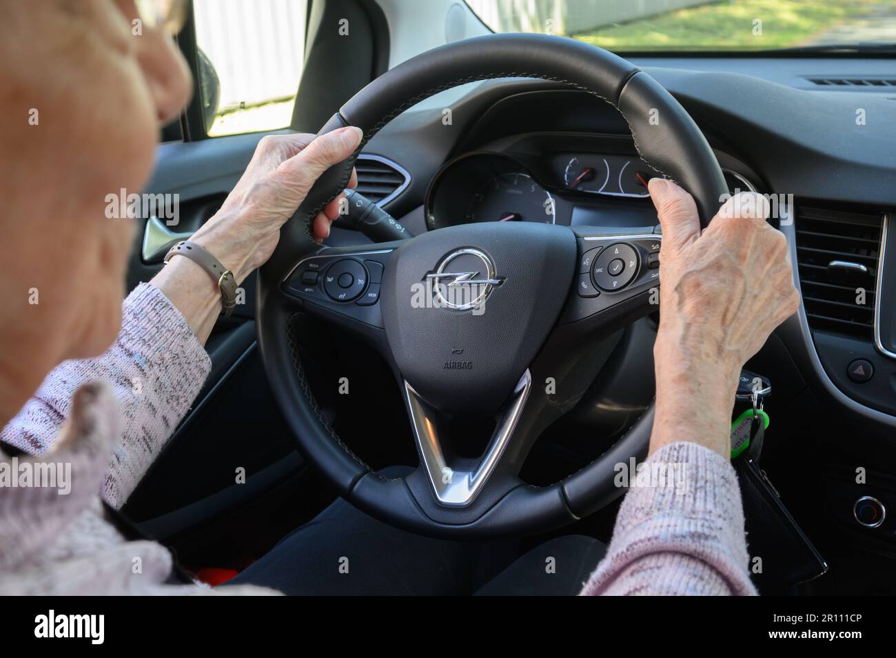 Burgdorf, Germany. 09th May, 2023. An elderly participant sits in a ...