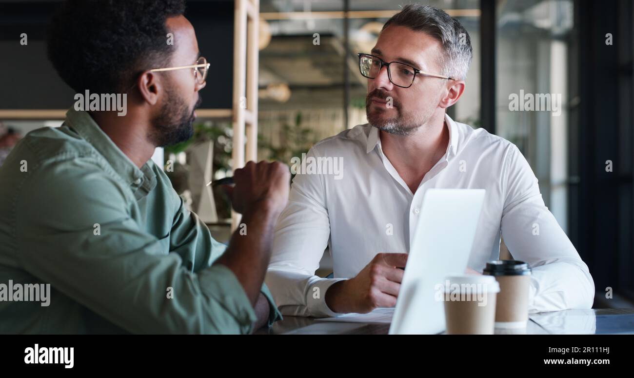 Teamwork is a must in making a business successful. two businessmen ...