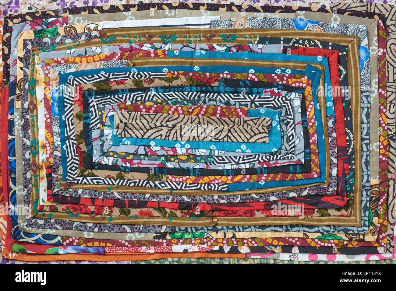 abstract of colorful patchwork fabrics pattern, small scraps of fabric ...