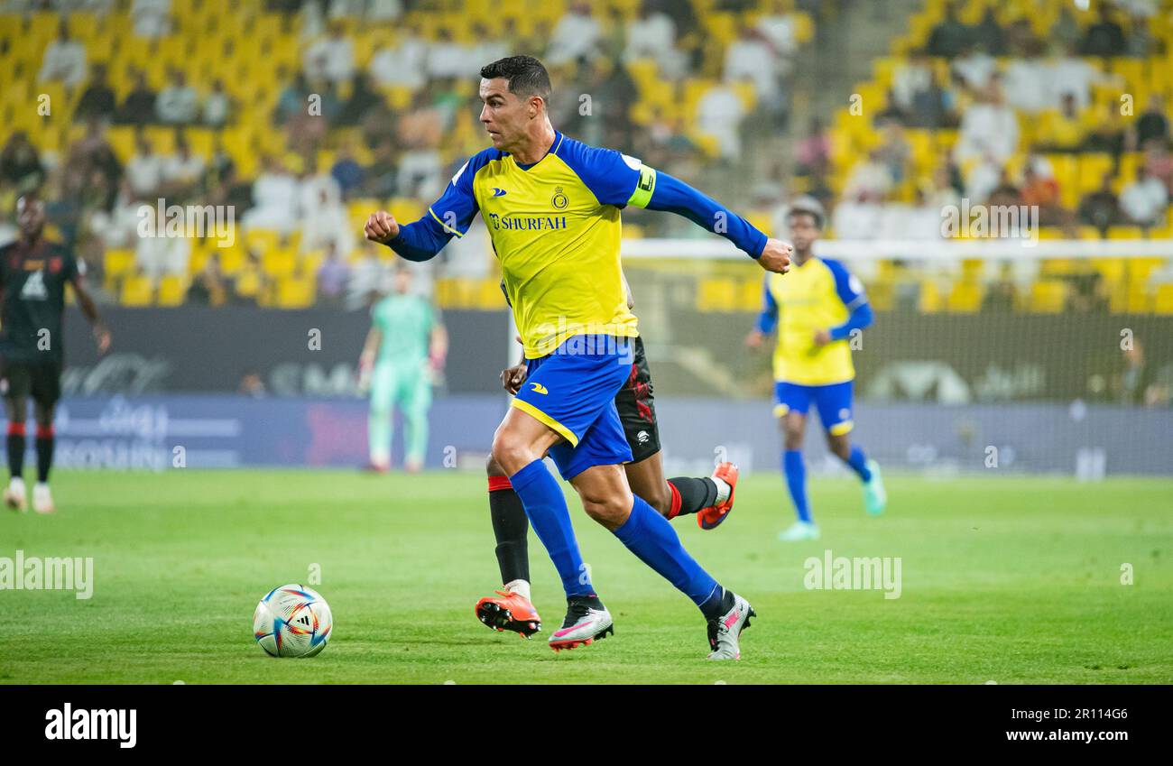 Cristiano Ronaldo of Al-Nassr FC in action against Al-Raed FC during ...