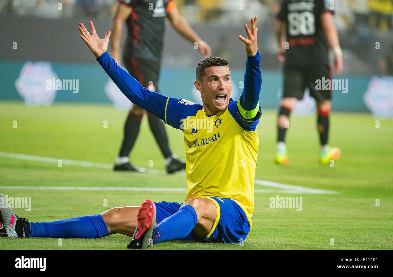 Cristiano Ronaldo of Al-Nassr FC in action against Al-Raed FC during ...