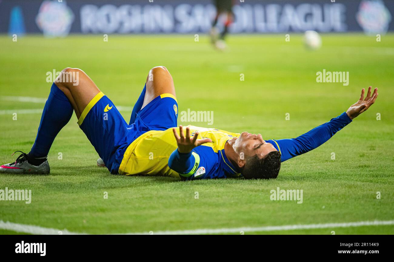Cristiano Ronaldo of Al-Nassr FC in action against Al-Raed FC during ...