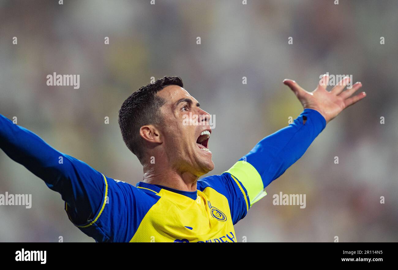 Cristiano Ronaldo of Al-Nassr FC in action against Al-Raed FC during ...