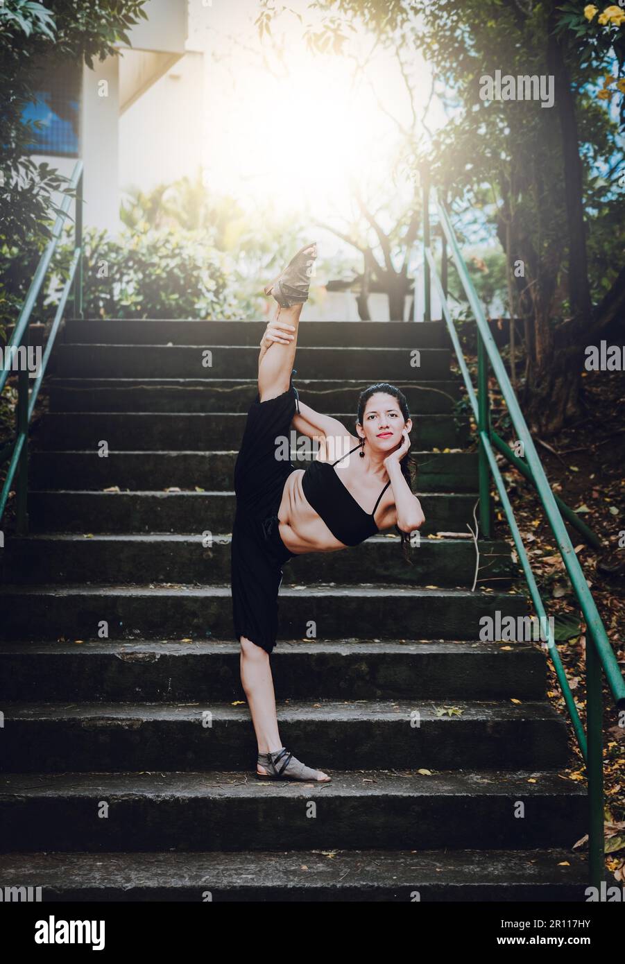 Dance artist girl doing acrobatics and flexibilities in heels. Dance ...