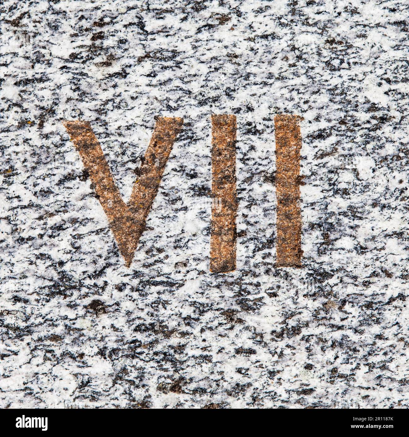 Roman numbers collection, from 1 to 7, on a real ancient granite Stock ...