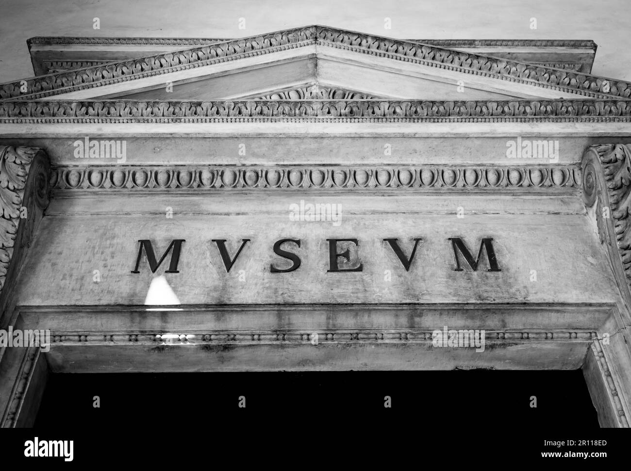 Entrance of an ancient museum, letters on original marble Stock Photo ...