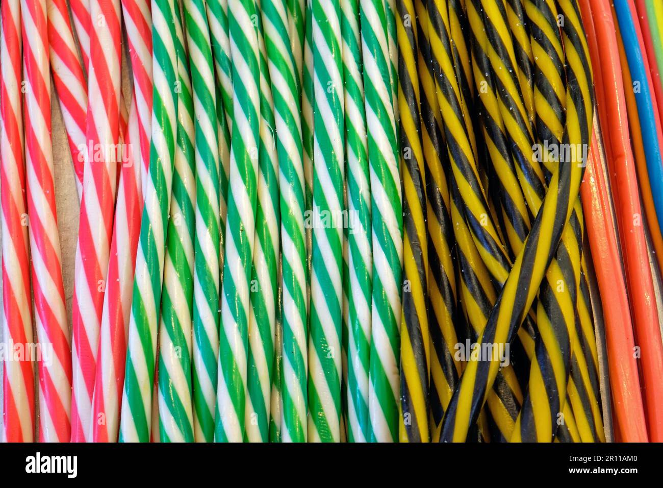 A colourful background of candy canes Stock Photo - Alamy