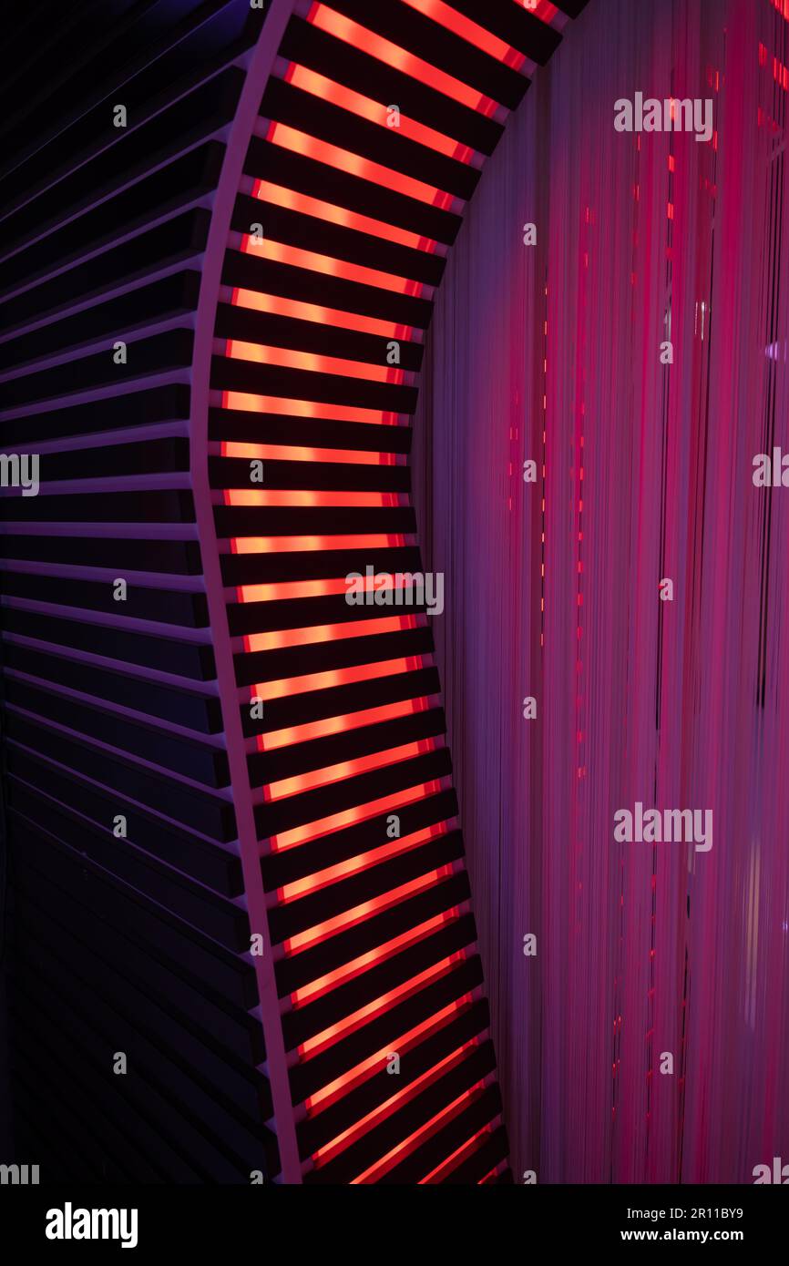 Illuminated Red Stripes on a Modern Column in Switzerland Stock Photo ...