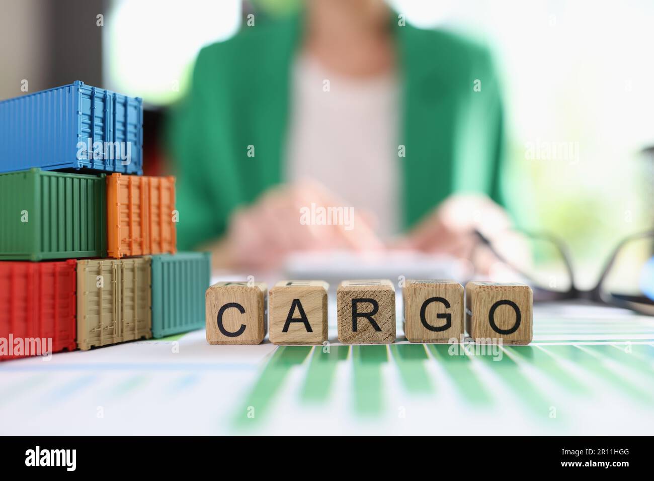 Cargo word collected with wooden cubes and shipping containers Stock ...