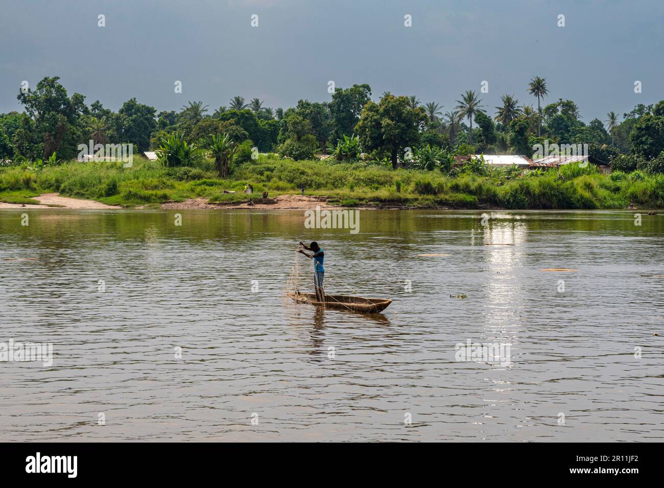 Fisherman in his dugout canoe, Wagenya tribe, Kisangani, Congo river ...