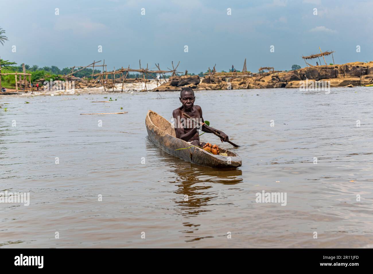Fisherman in his dugout canoe, Wagenya tribe, Kisangani, Congo river ...