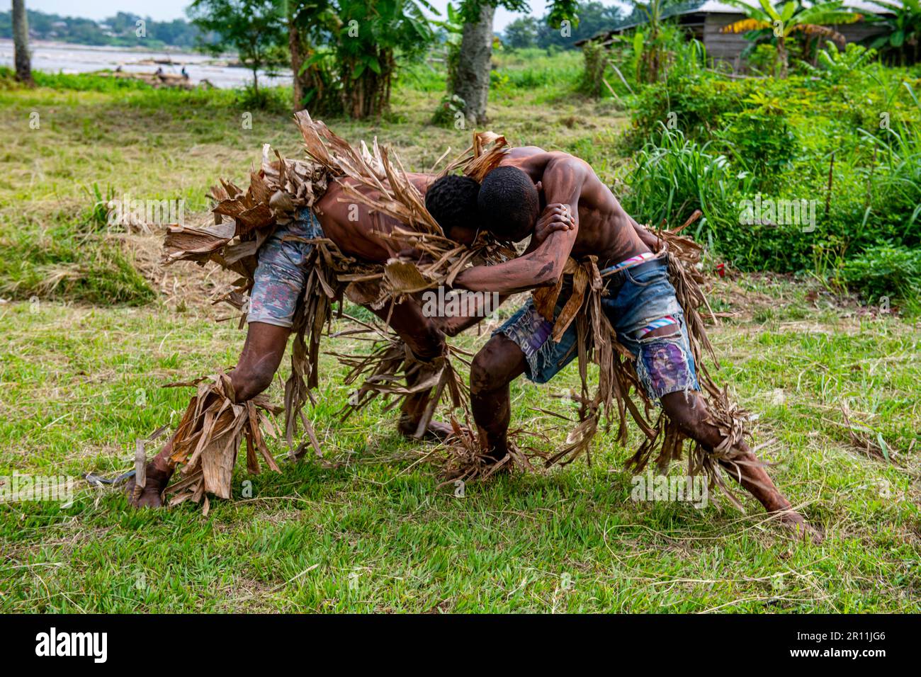 Wagenya tribal men practising wrestling, Kisangani, Congo river, DR ...