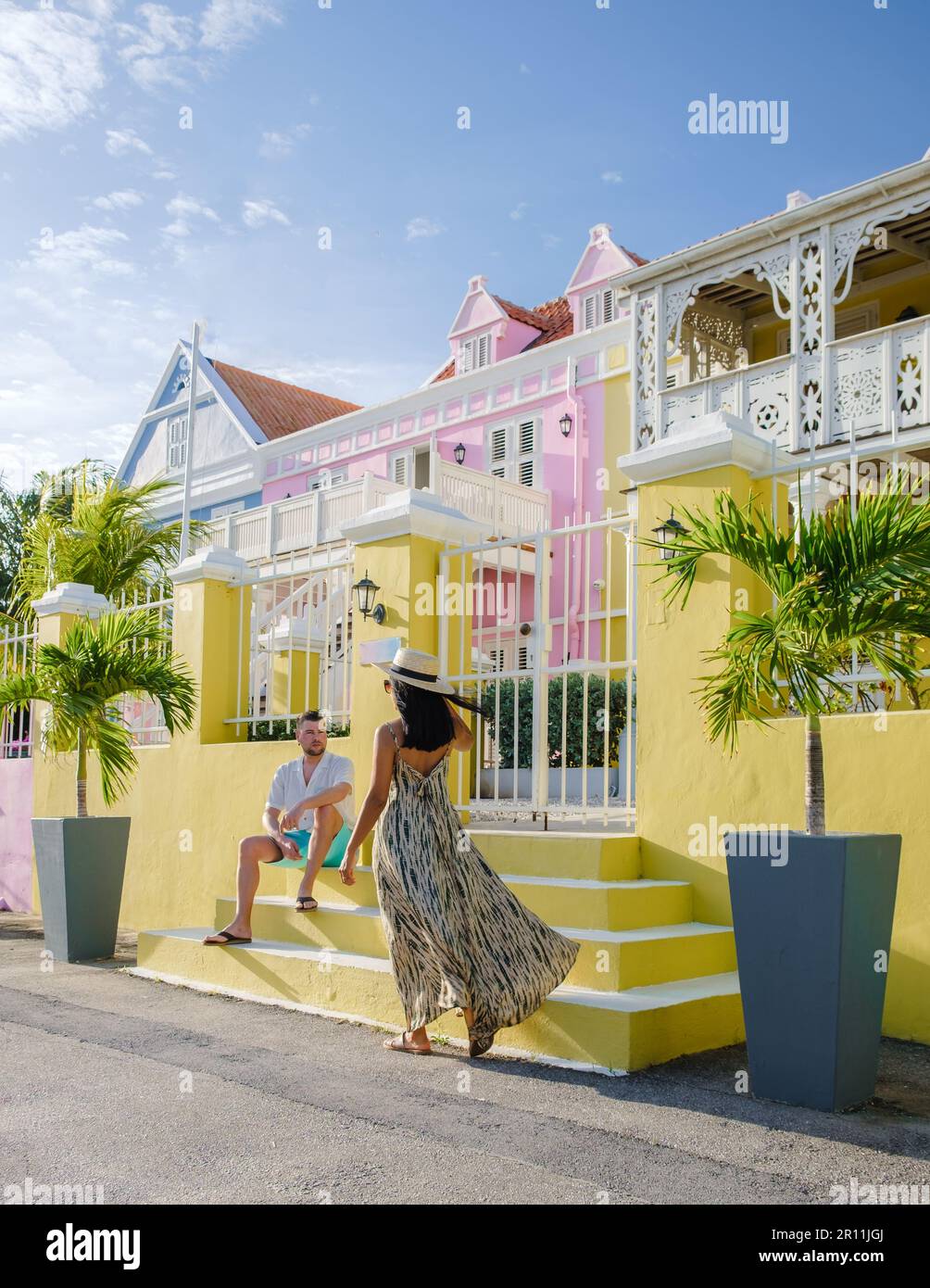 couple men and woman on vacation in Curacao visiting Pietermaai Street ...