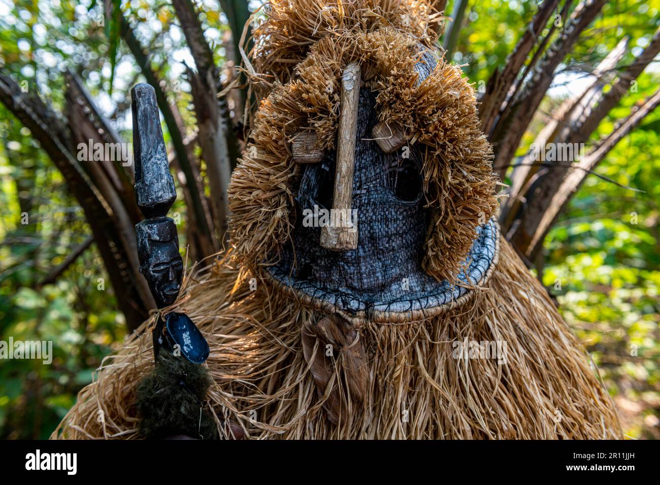Traditional masked man, Yaka tribe, Mbandane, Congo Stock Photo - Alamy