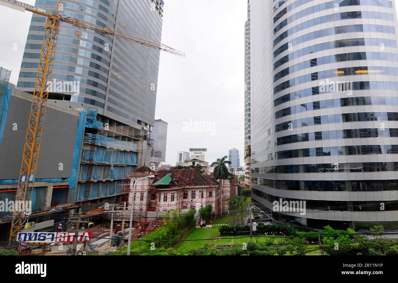 Construction of the modern Maha Nakhon building and renovating the Old Russian Embassy building ...