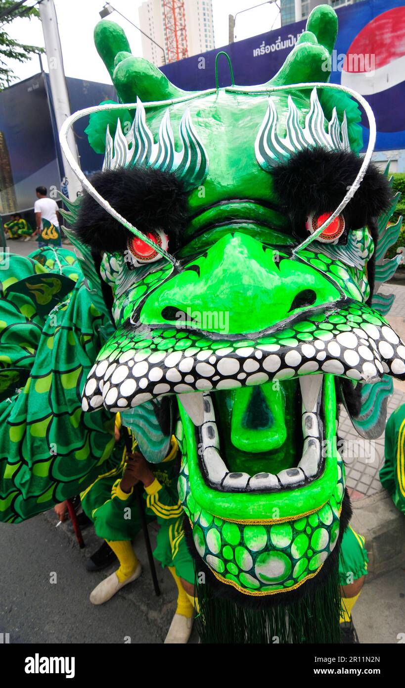 A colorful parade along Charoen Nakhon Rd in Bangkok, Thailand Stock ...