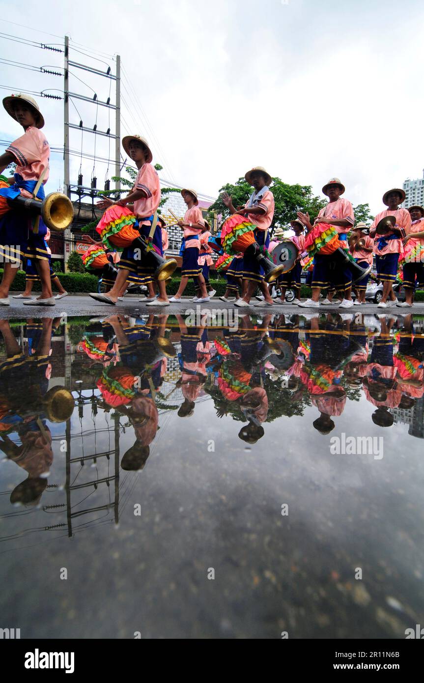 A colorful parade along Charoen Nakhon Rd in Bangkok, Thailand Stock ...