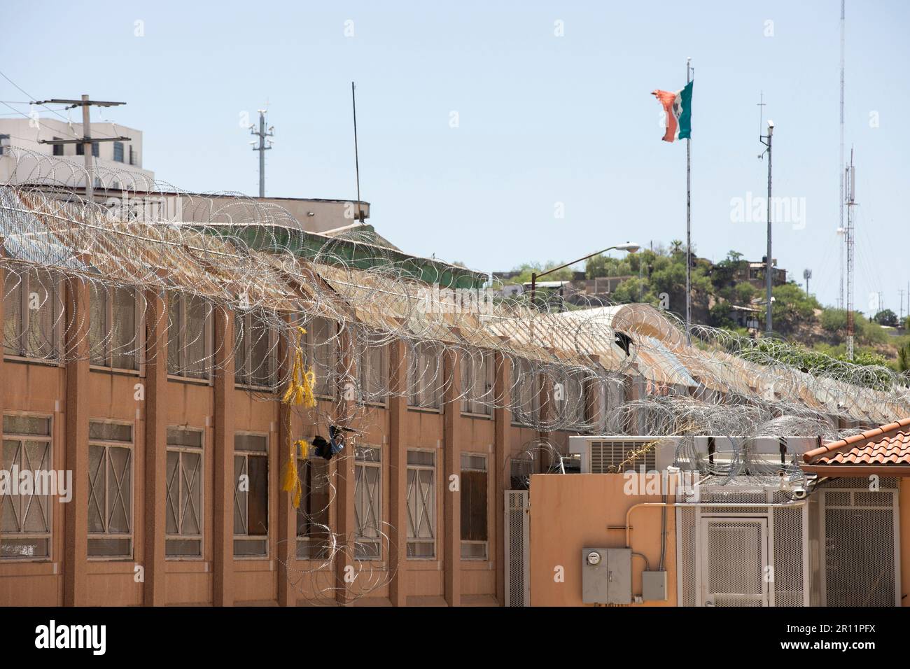 Daytime view of the fortified USA Mexico border wall as it runs through ...