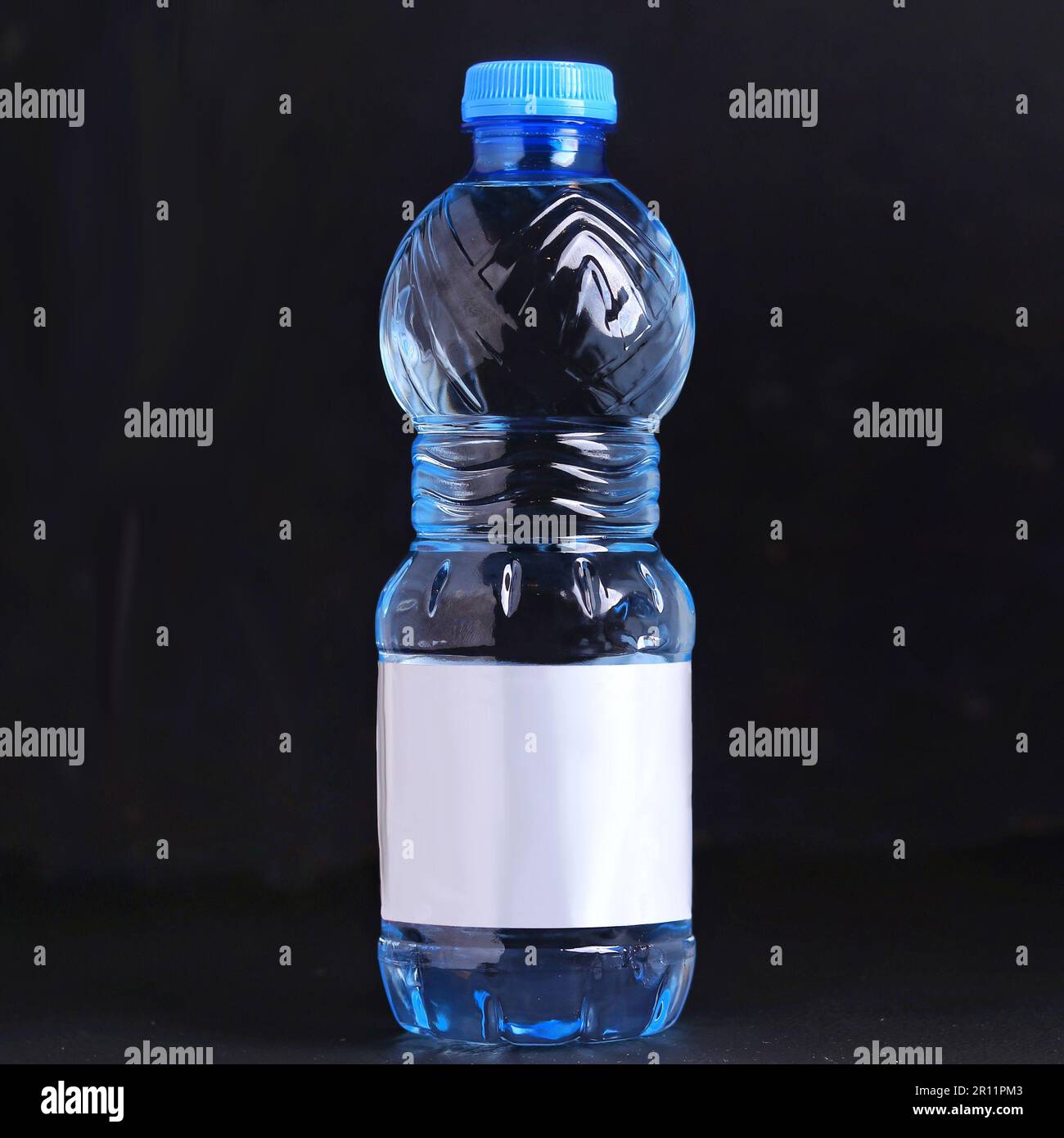 bottled pure water mockup isolated black background, water bottle 500ml ...
