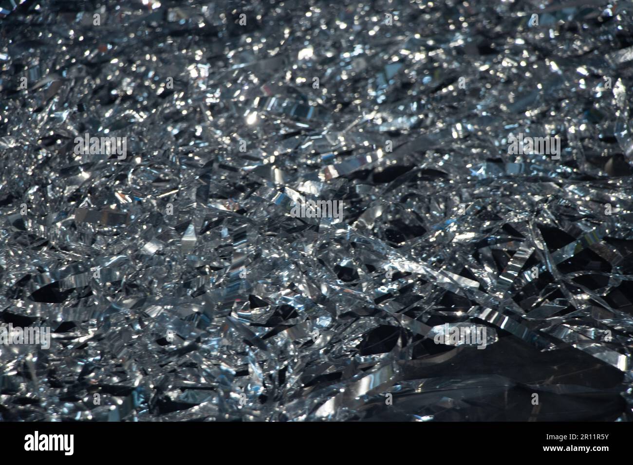 thin sliced strips of foil as a background Stock Photo - Alamy