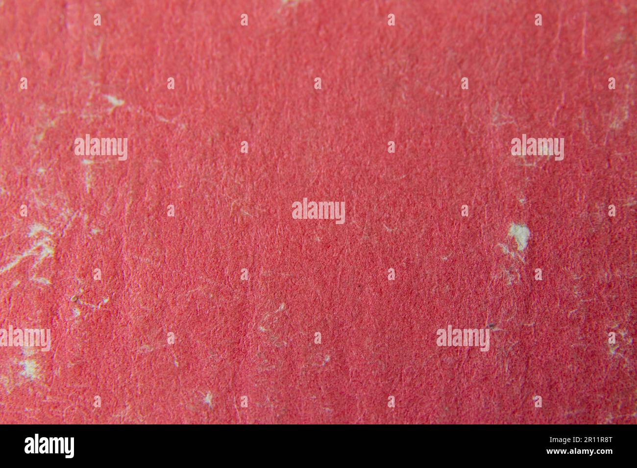 old light red background book cover macro Stock Photo - Alamy