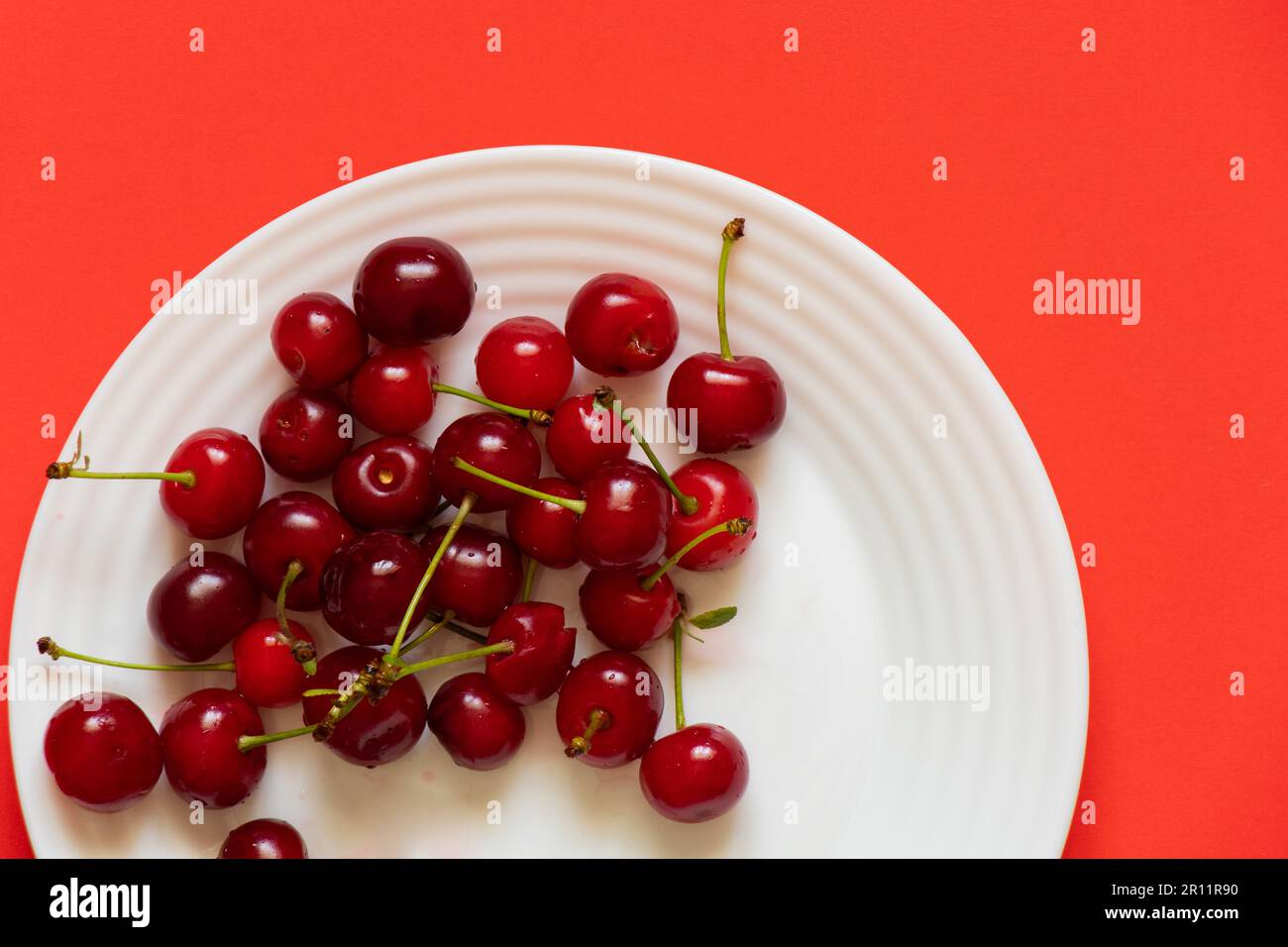 Sweet cherry in plate hi-res stock photography and images - Alamy