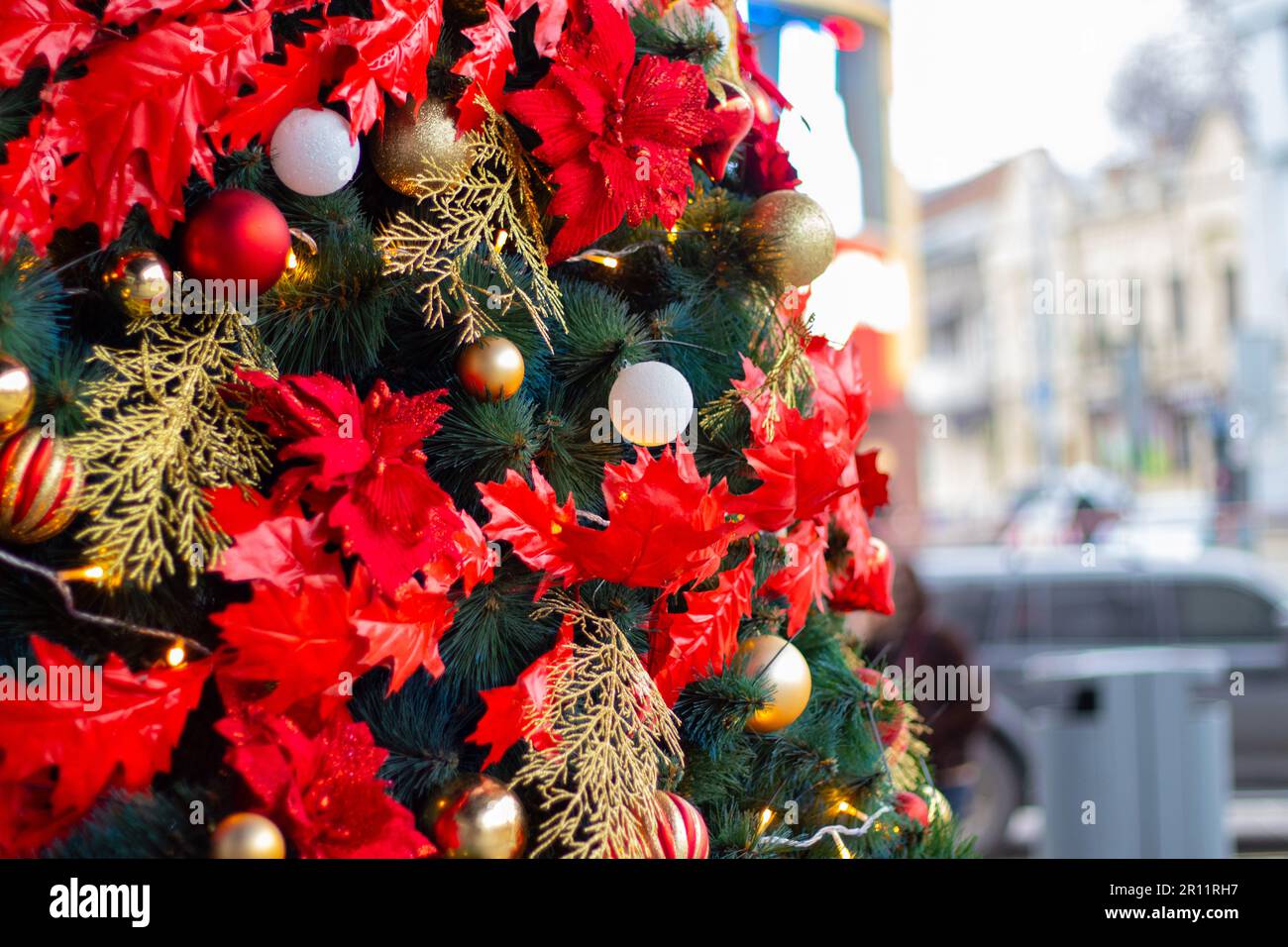 Christmas tree on the street as a background Stock Photo - Alamy