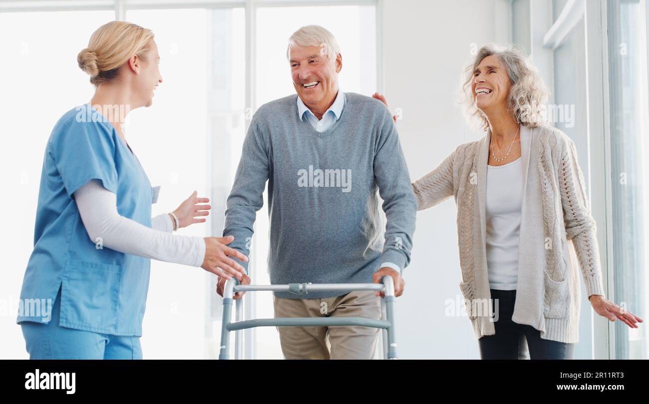 Giving him the care that he deserves. a senior man using a walker with ...