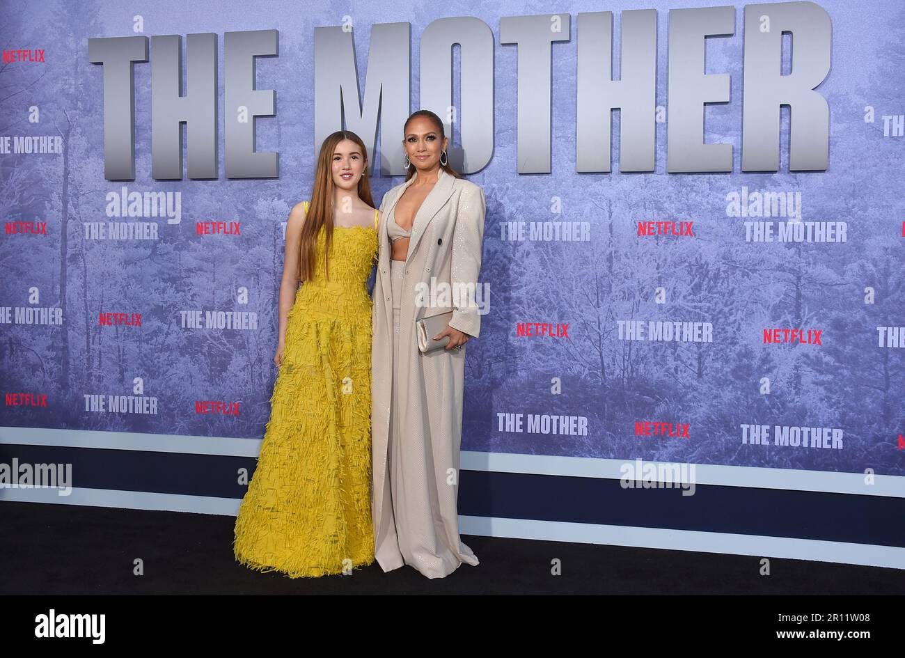 Lucy Paez, left, and Jennifer Lopez arrive at the Los Angeles premiere ...