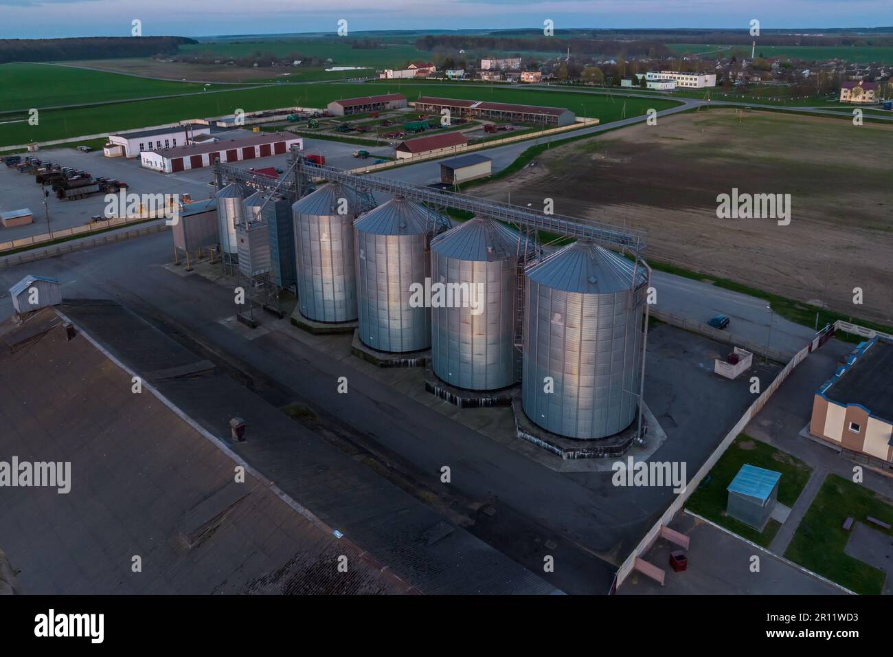 aerial panoramic view on agro-industrial complex with silos and grain ...