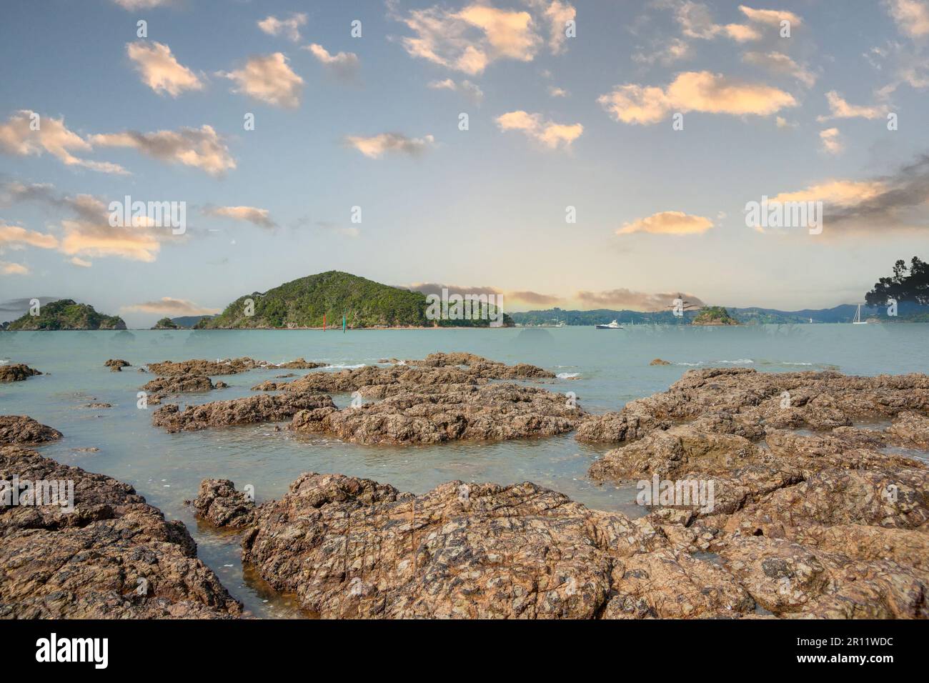 Paihia waterfront landscape view across harbour to bush clad island ...