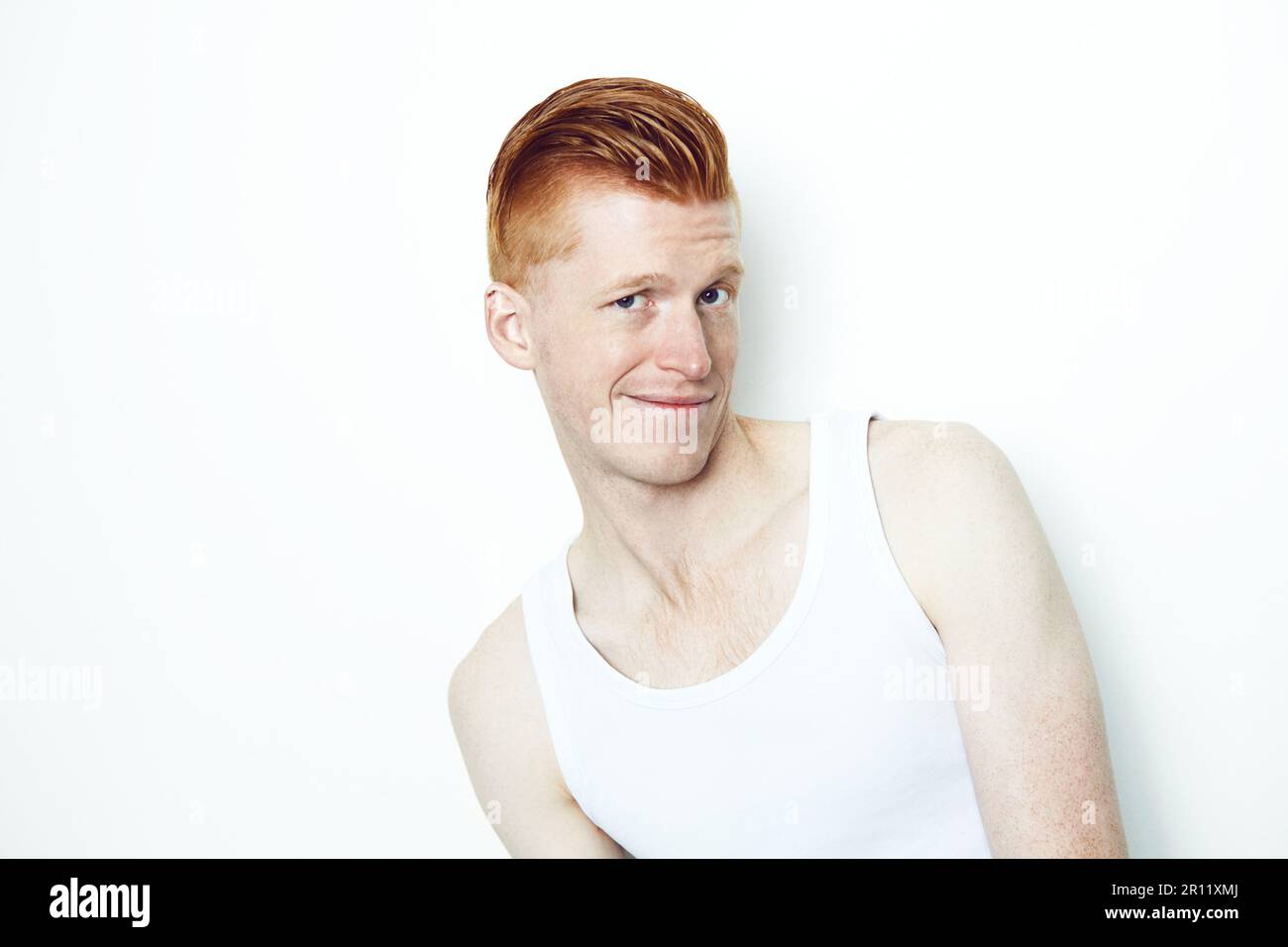 Portrait, doubt and a ginger man in studio isolated on a white ...