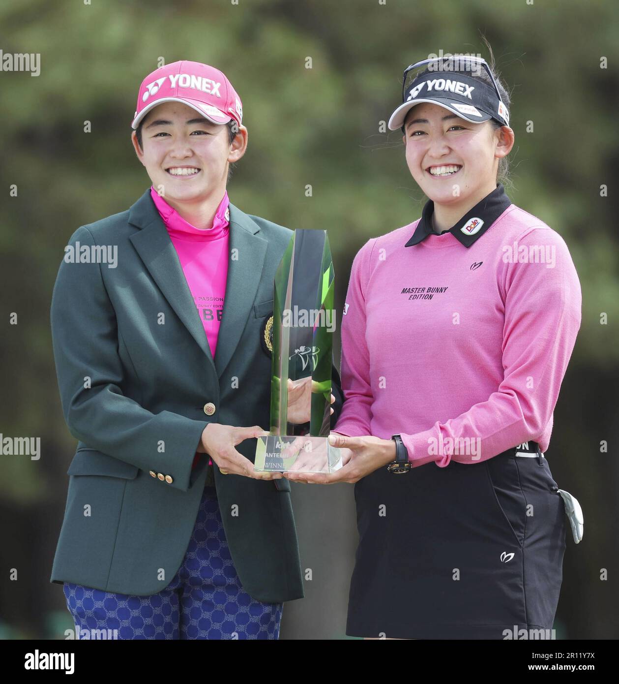 Akie Iwai (L) poses for a photo with her younger sister Chisato after ...