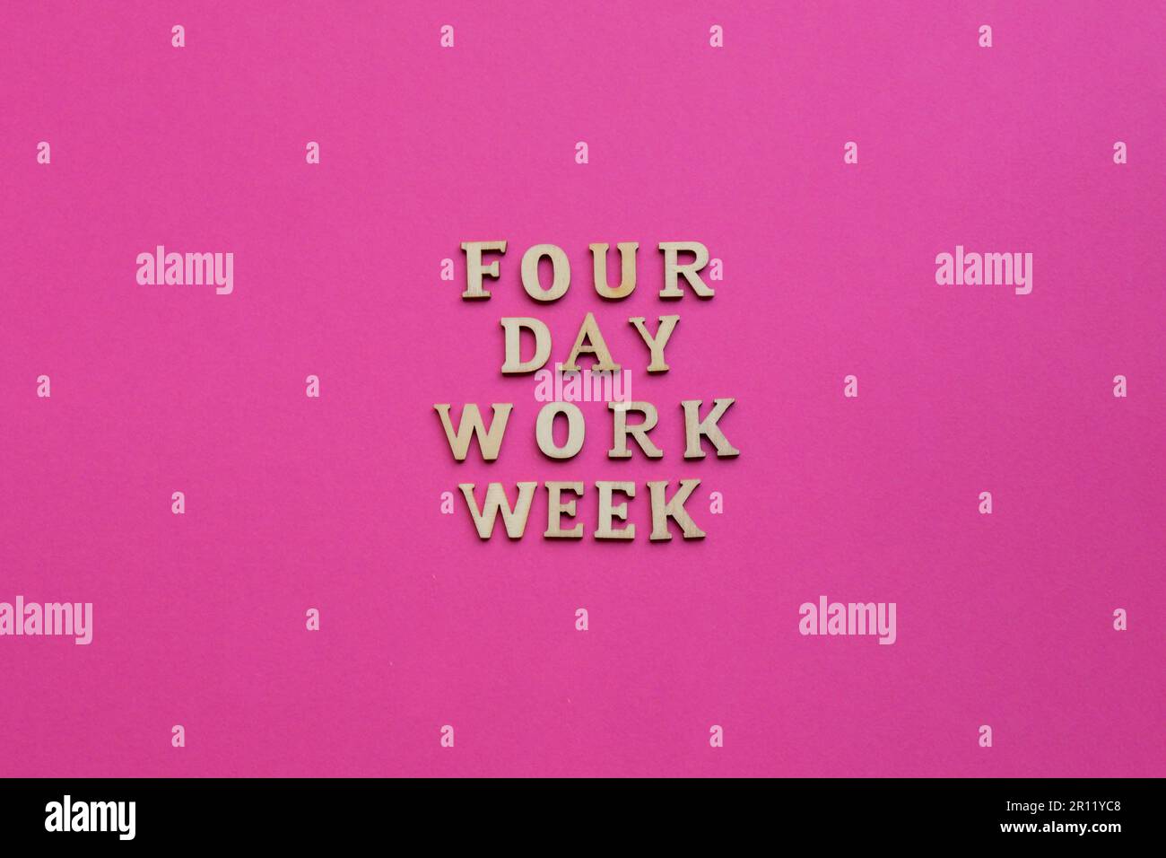 4 day work week symbol wooden letters four day working week concept. Modern approach doing ...