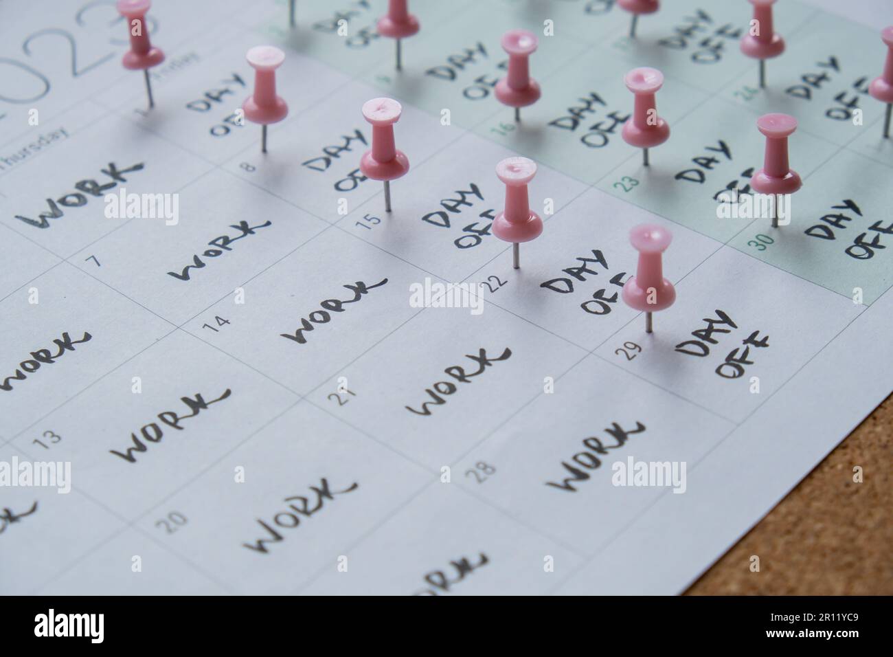 4 day work week printed calendar with pink pins on three days off in week weekend days four day ...