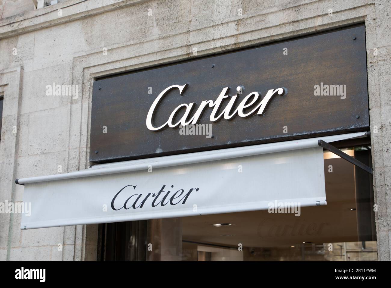 lyon , Aura France - 05 01 2023 : Cartier logo brand and store sign ...