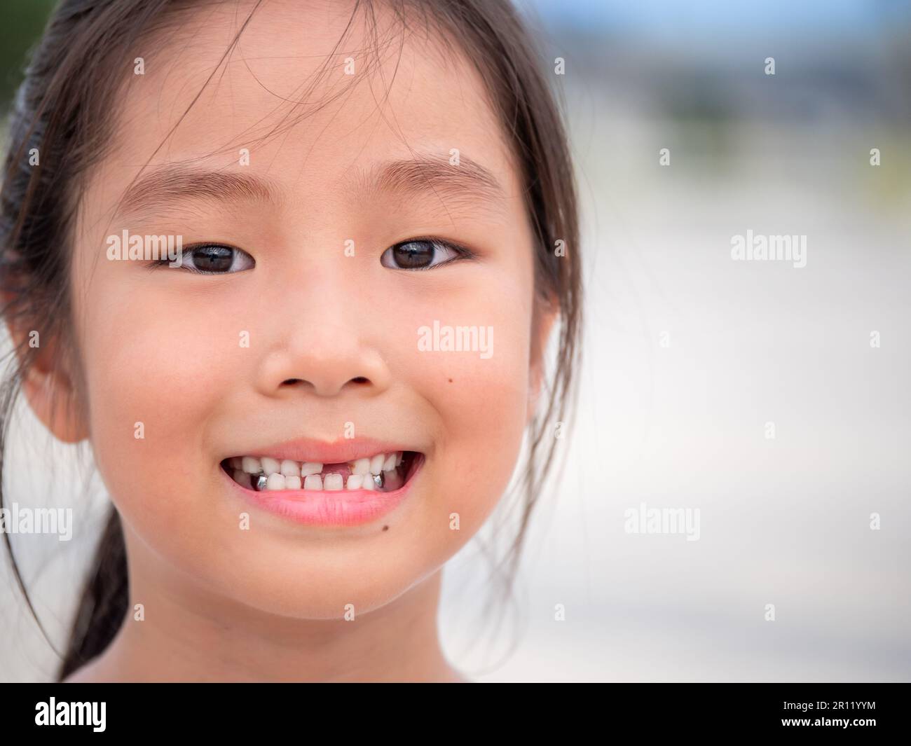 close up shot of face asian child cute or kid girl smiling eyes white ...