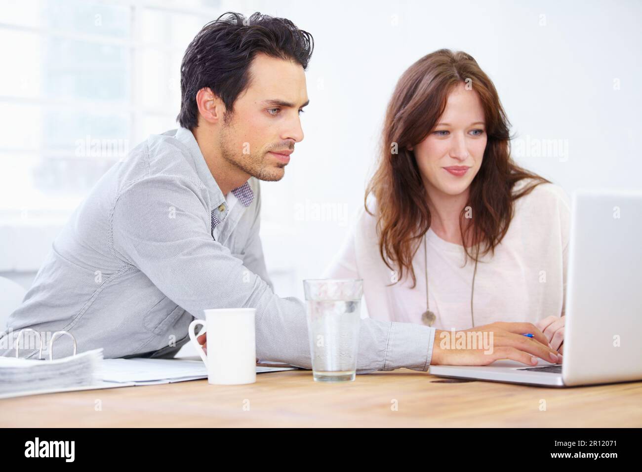 Laptop, collaboration and business people with teamwork, planning and online support in office ...