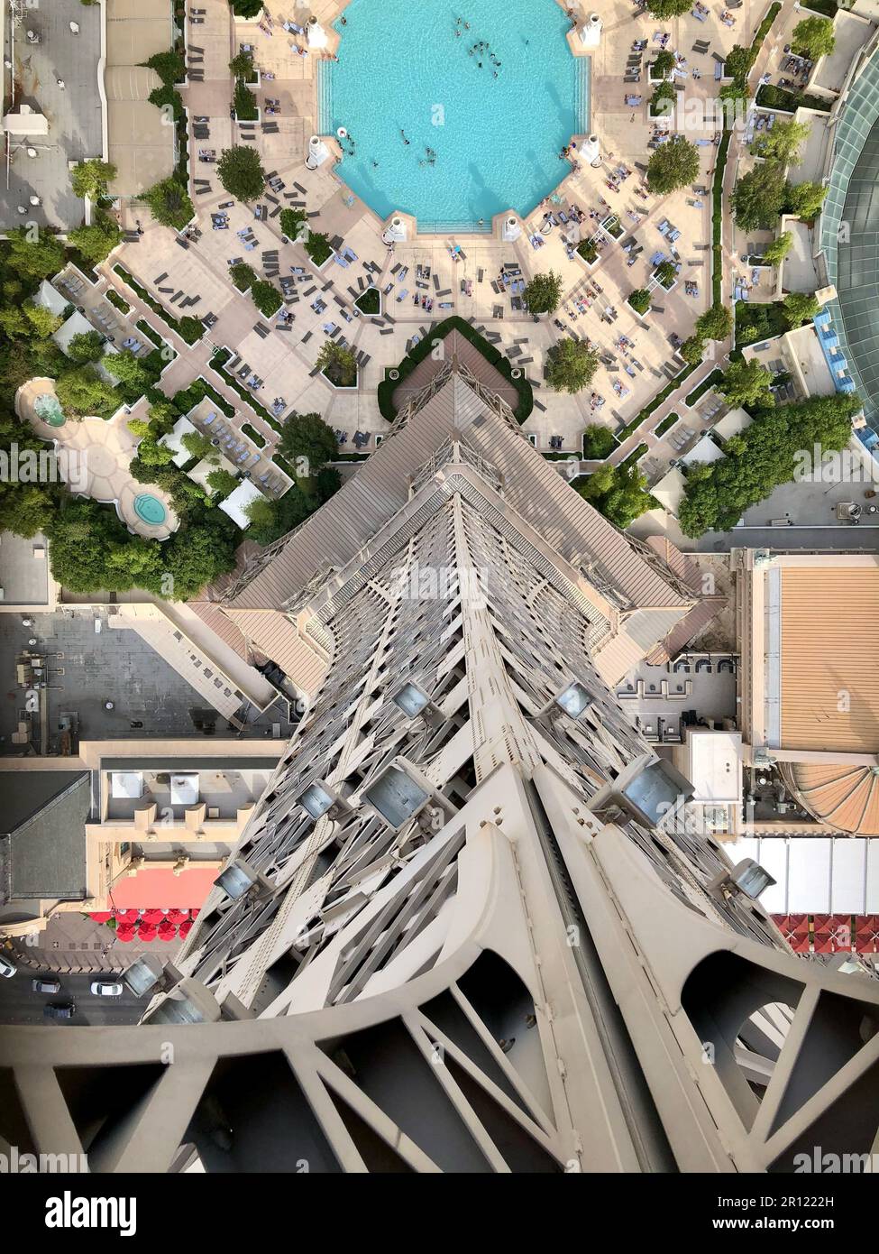 An aerial shot of a striking modern skyscraper with an impressive ...