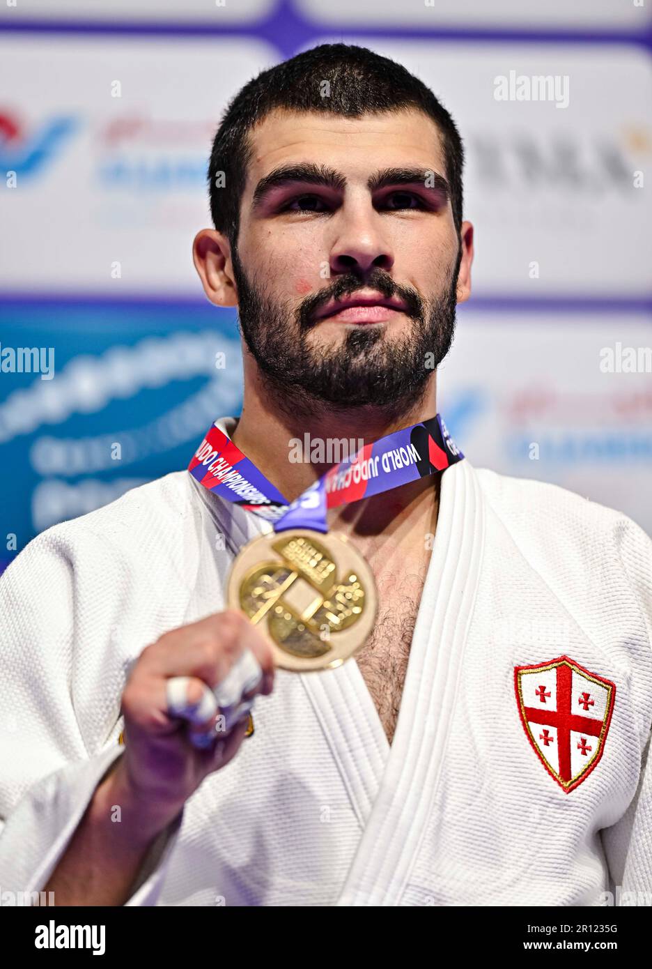 Doha. 10th May, 2023. Gold medalist Tato Grigalashvili of Georgia poses ...