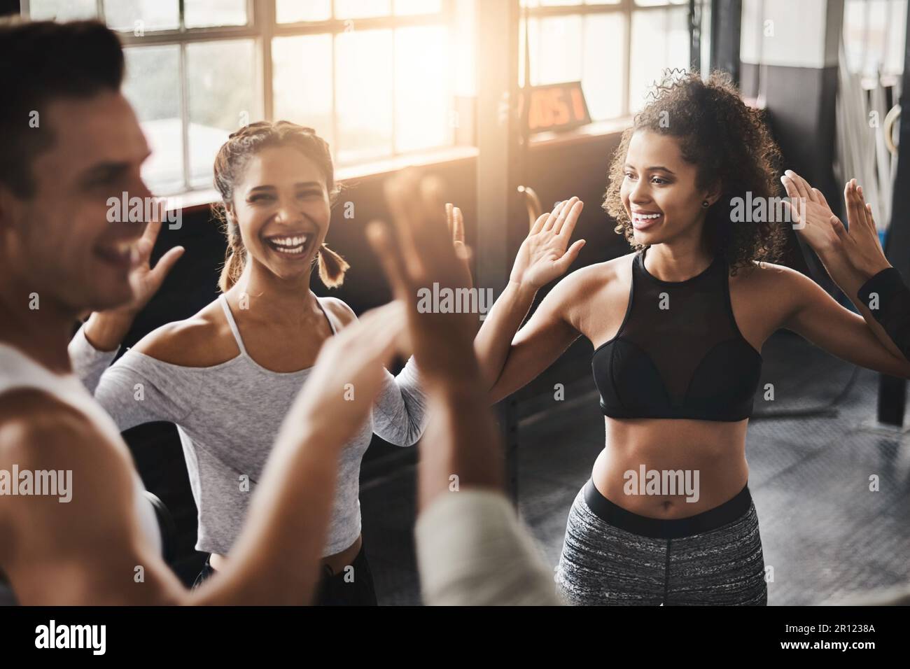 Nothing lifts the spirits like exercise. a group of young people ...