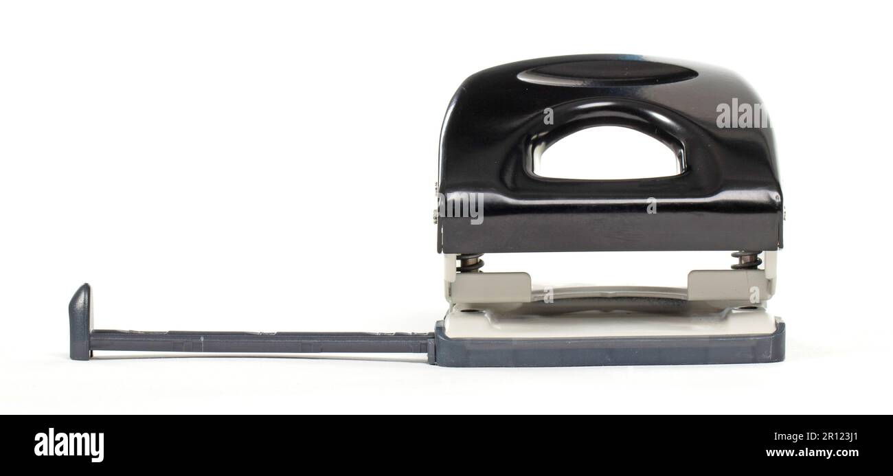 Black office puncher over a white background Stock Photo - Alamy